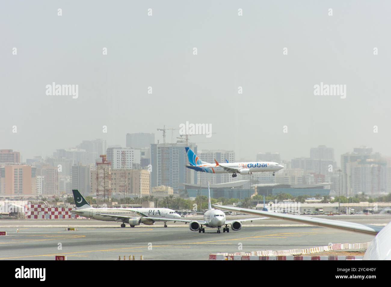 The Flydubai plane takes off from Dubai International Airport, UAE ...