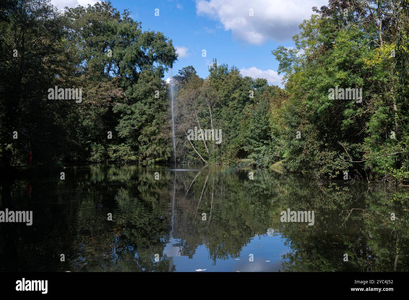 Mertert Luxembourg 2nd October 2024 Autumn colours reflected in the waters of a pond in Parc ...
