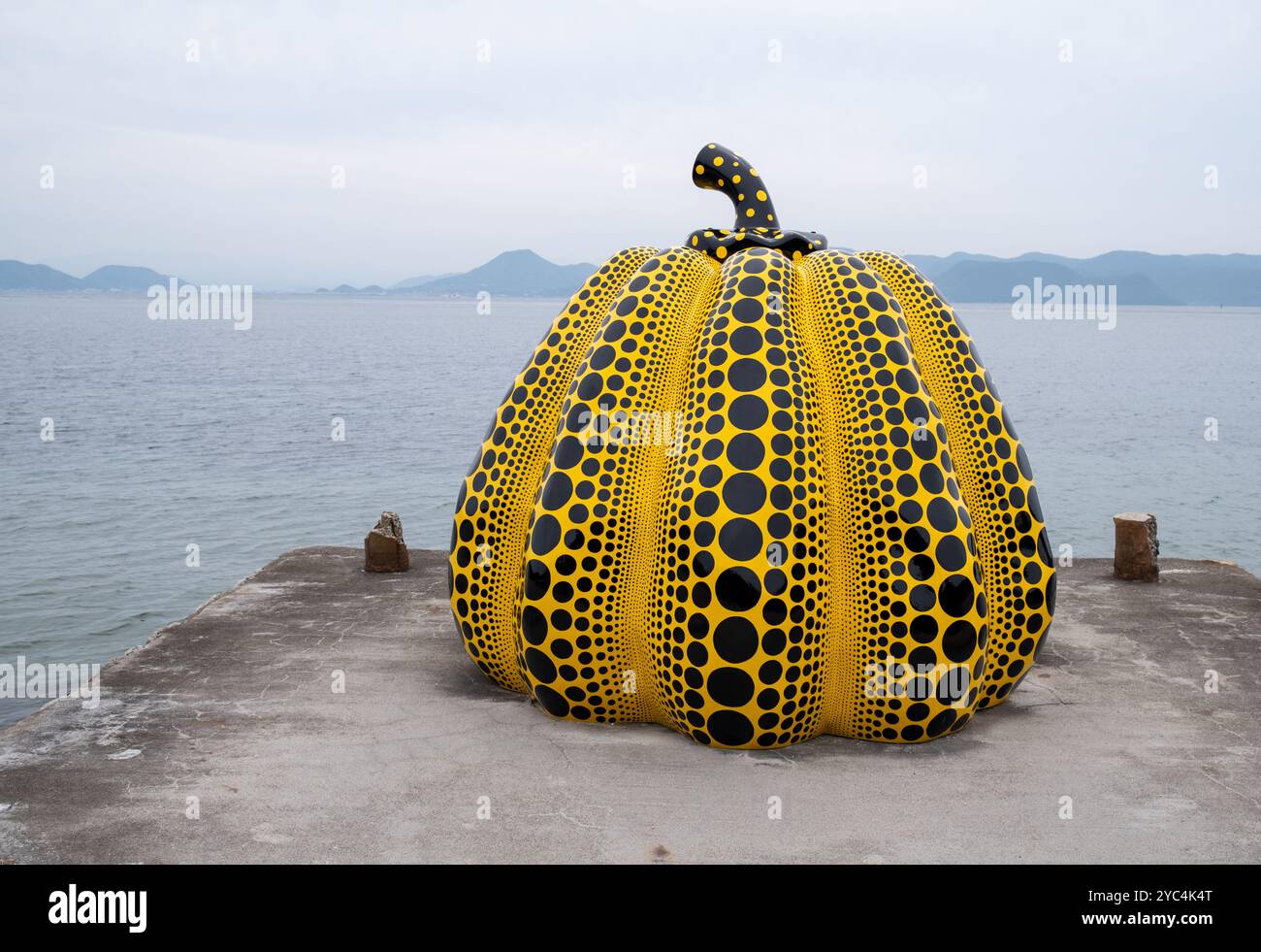 Yayoi Kusamas Pumpkin Sculpture on the island of Naoshima in Japan ...