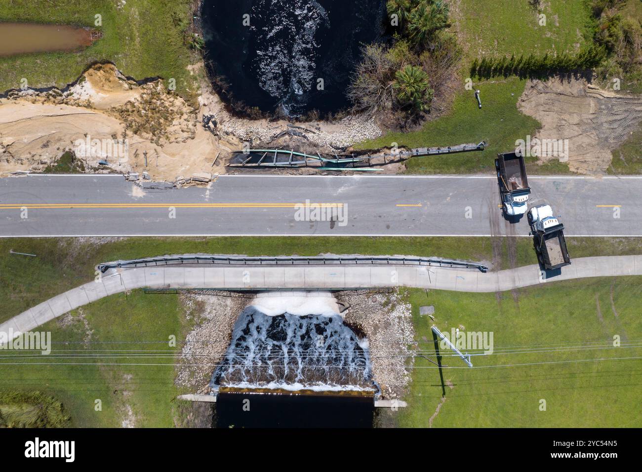 Repair of destroyed bridge after hurricane flood in Florida ...