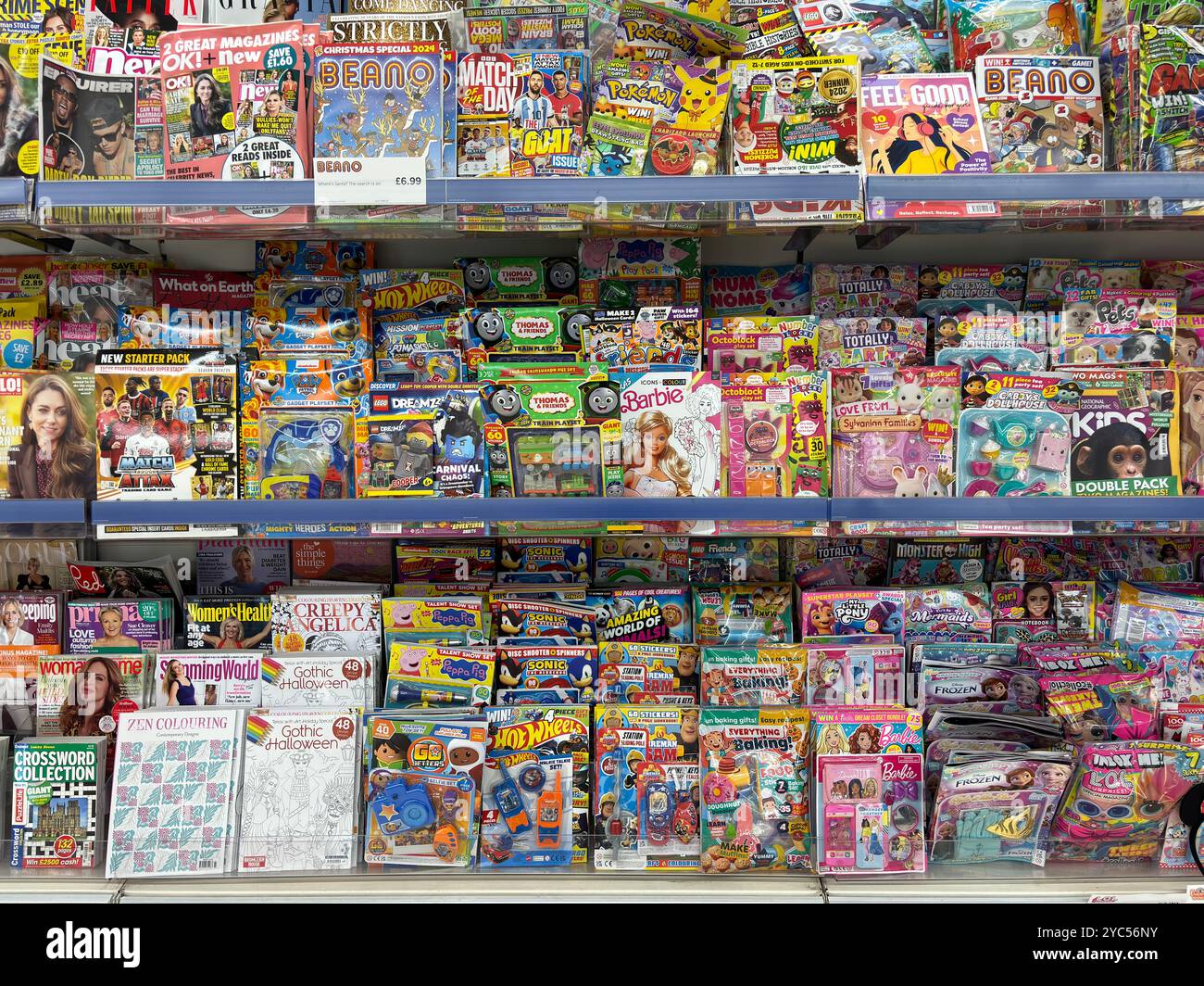 Shop shelves displaying magazines and comics, UK Stock Photo - Alamy