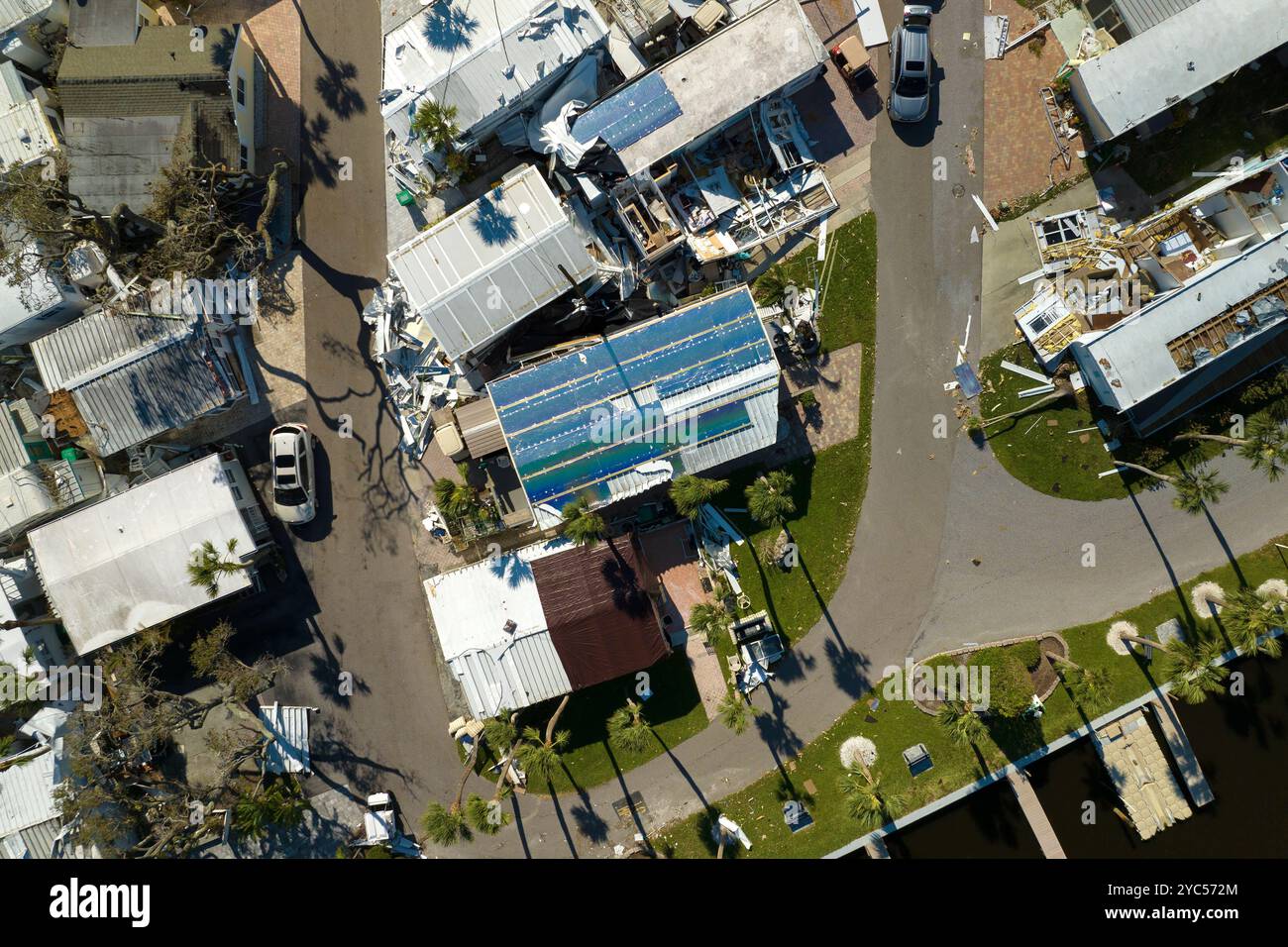 Consequences of natural disaster. Severely damaged houses after ...