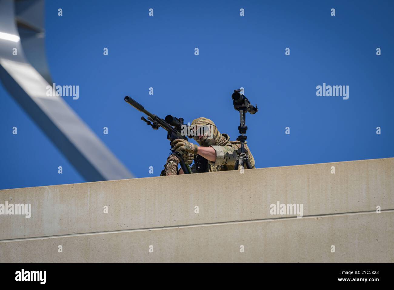 Canberra, Australia. 21st Oct, 2024. A spinier is seen guarding at the rooftop of the Parliament ...
