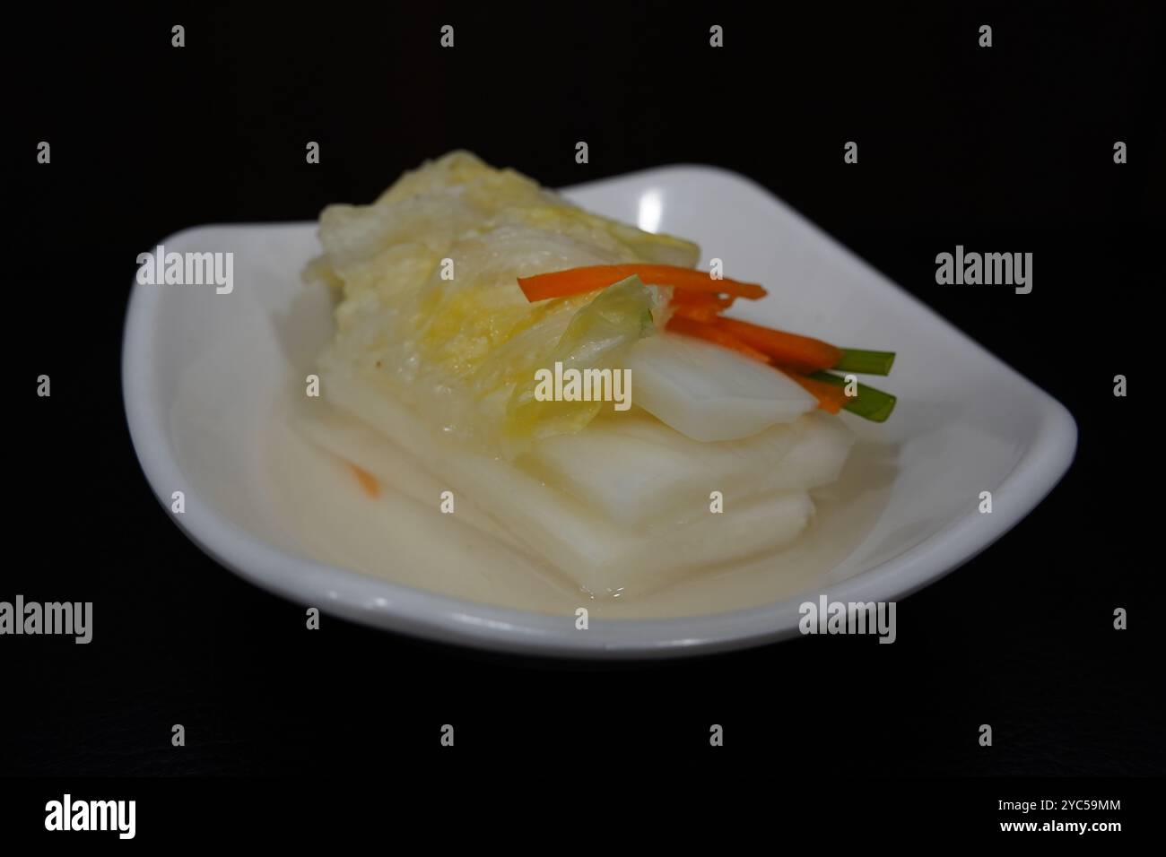 White kimchi is a type of kimchi made without using red pepper powder ...