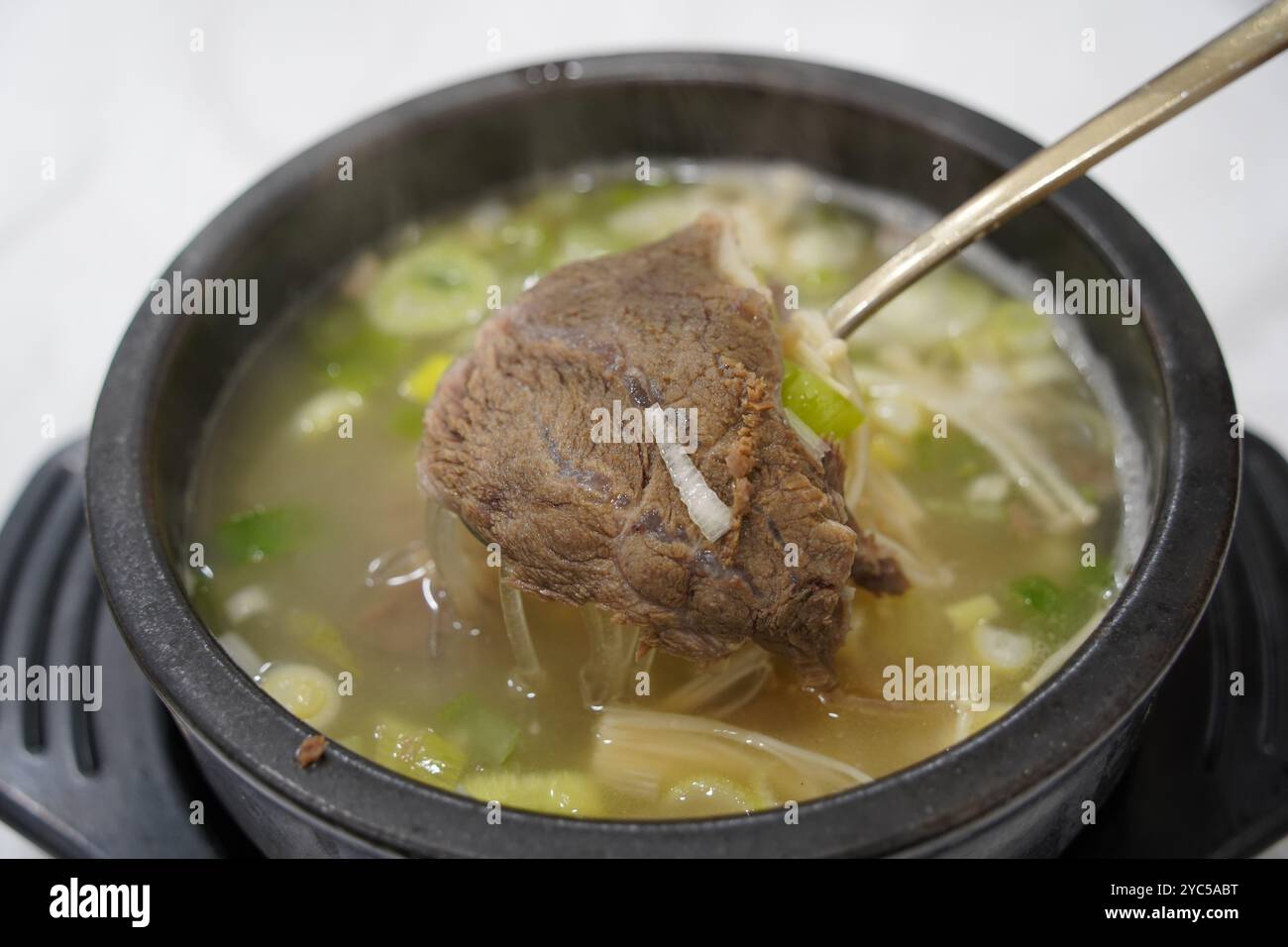 traditional Korean soup made by boiling beef head meat, ox bones ...
