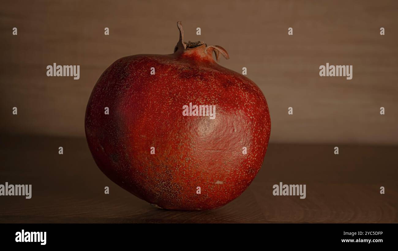 Close up whole pomegranate hi-res stock photography and images - Alamy