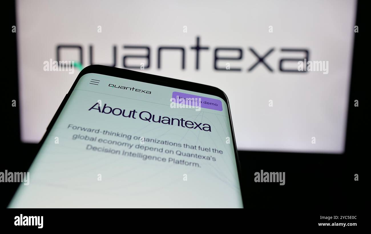 Mobile phone with website of British data analytics company Quantexa ...