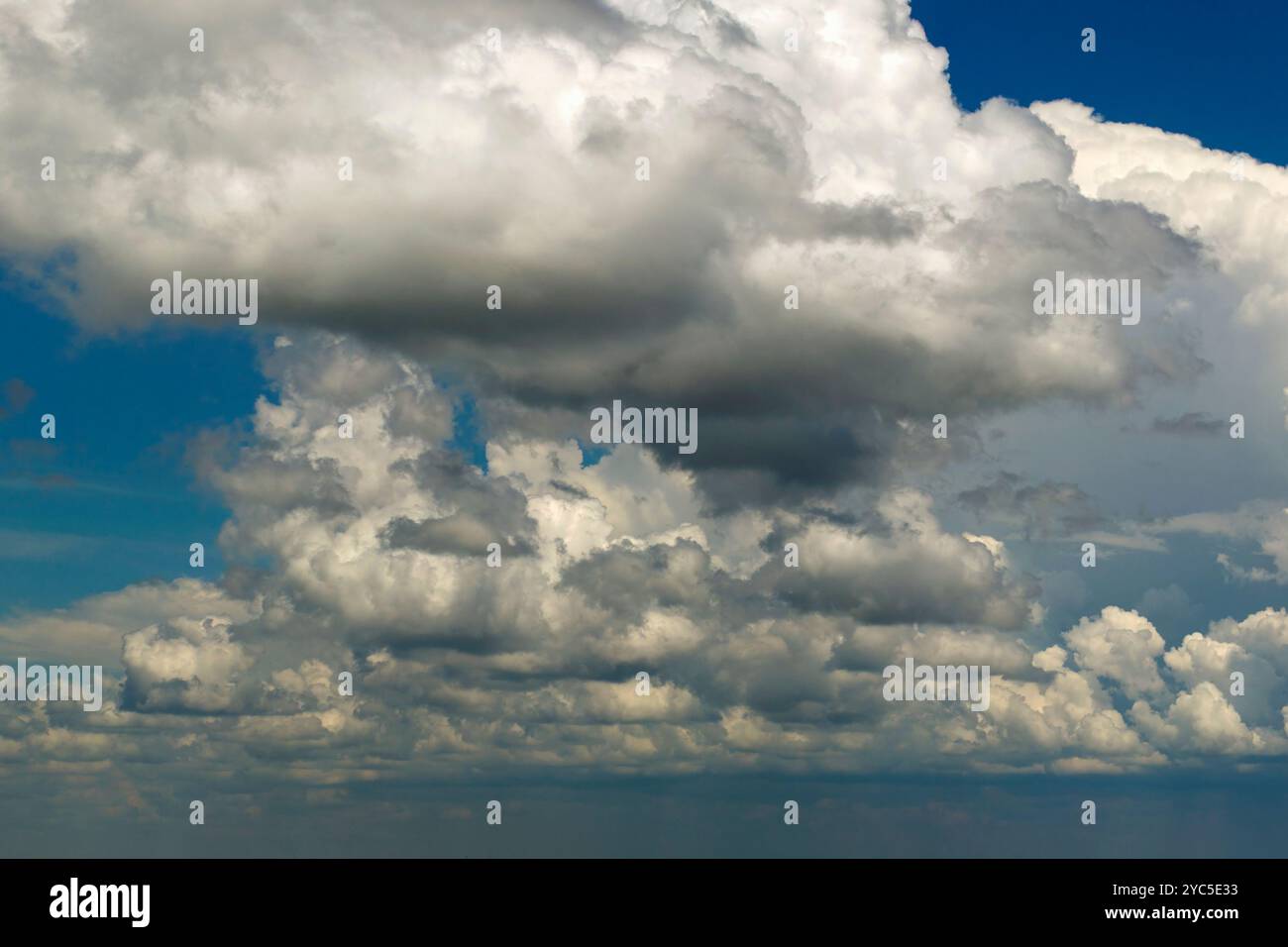 Blue sky with white clouds. Bright summer skyscape Stock Photo - Alamy