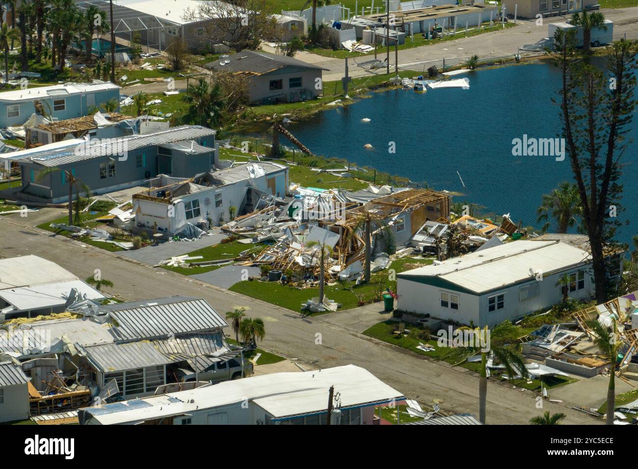 Severely damaged houses after hurricane Ian in Florida mobile home ...
