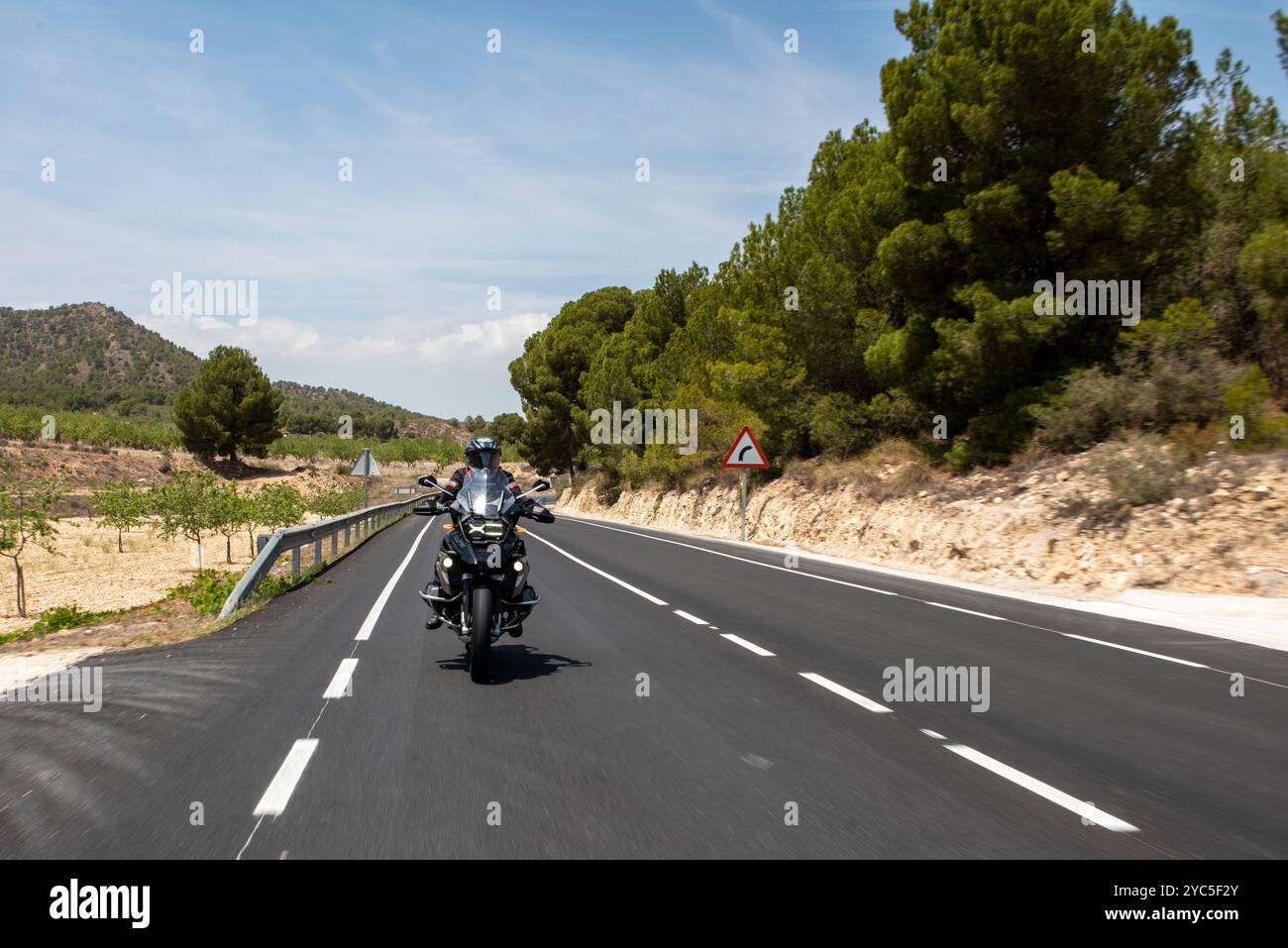 Riding a motorcycle on the open road Stock Photo - Alamy