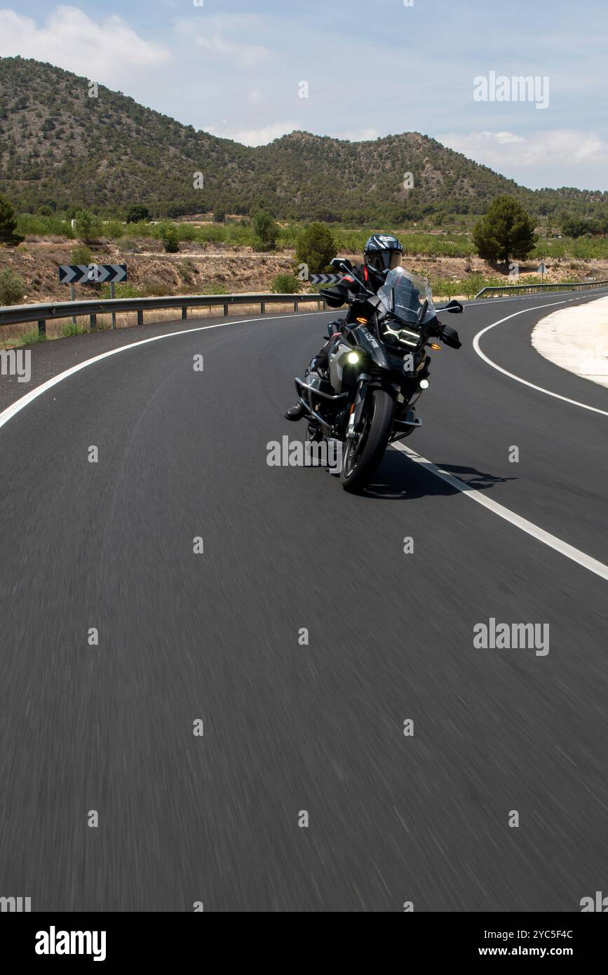 Riding a motorcycle on the open road Stock Photo - Alamy