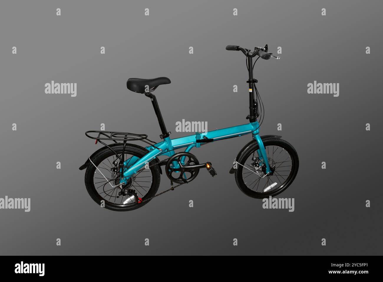 Folding compact bike. Close-up. Isolated on a gray background Stock ...