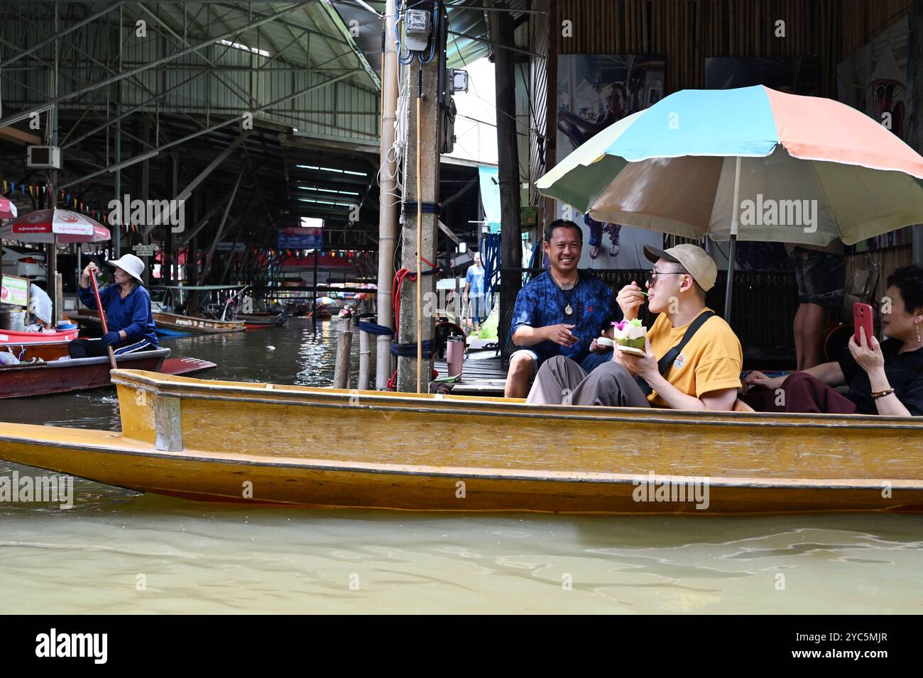 "Floating market Thailand" Portrait of a tourist enjoying coconut ice ...