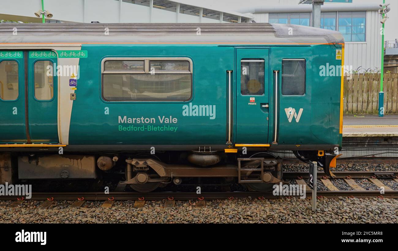 A Class 150 DMU train standing at a platform in Bletchley station at ...
