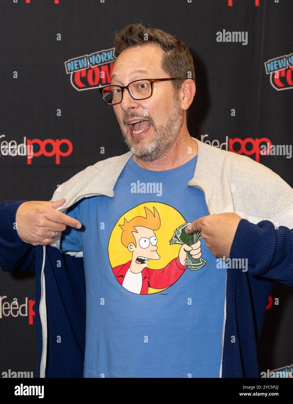 Thousands of people attend New York Comic Con at Jacob Javits Center on ...