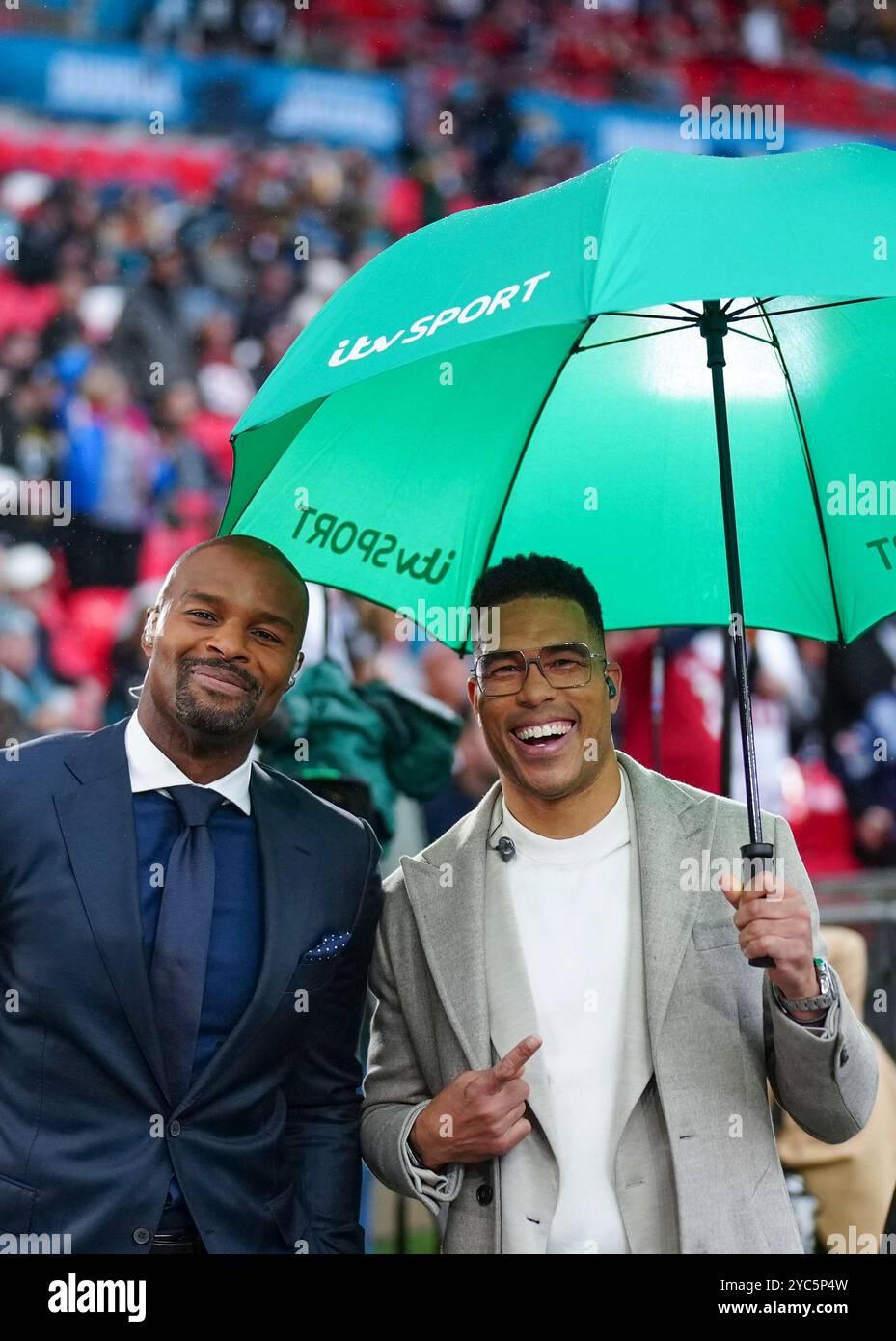 NFL Presenters Osi Umenyiora and Jason Bell. before an NFL football ...