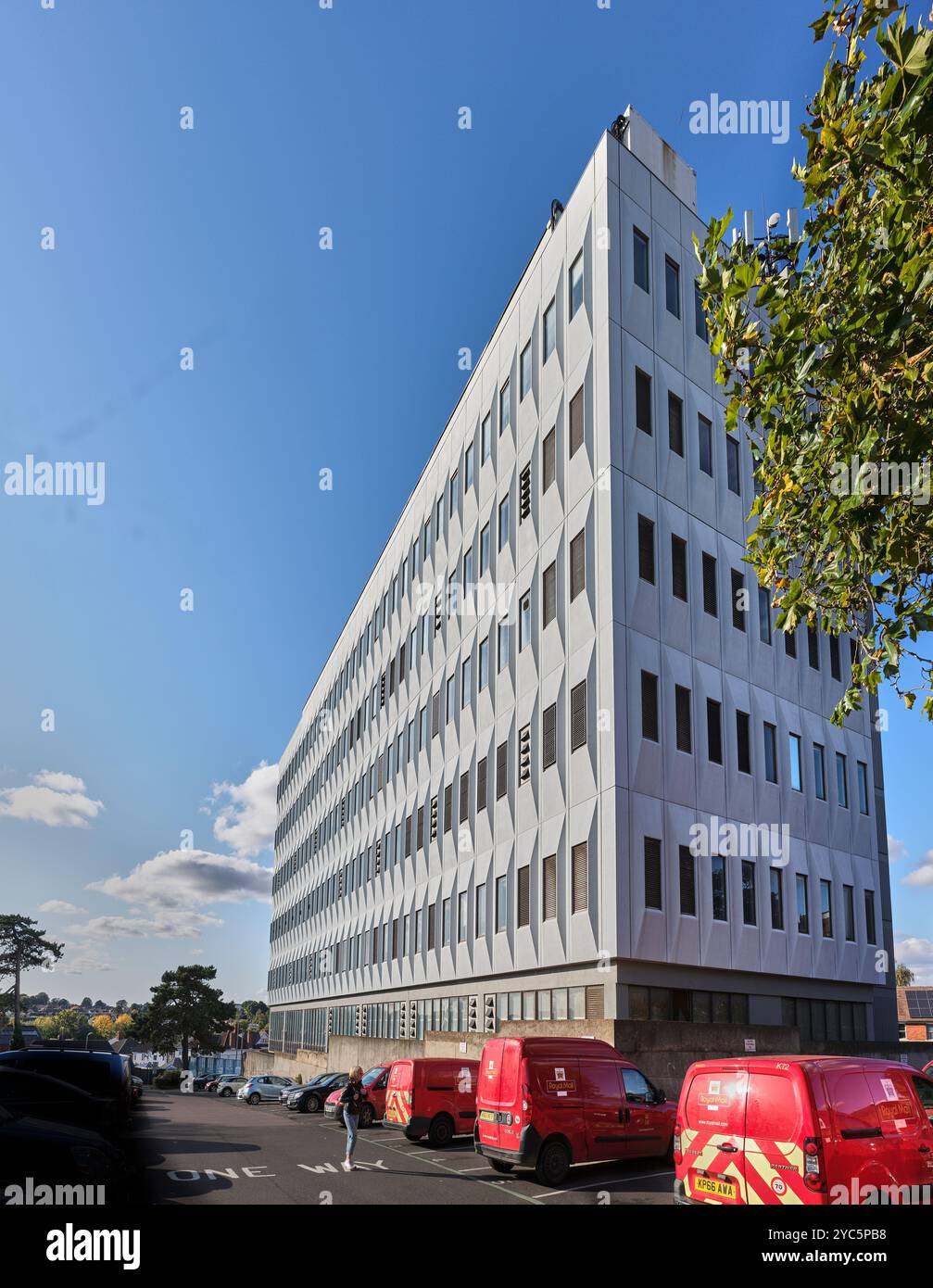 Small red vans in the car park outside the BT telephone Exchange and ...