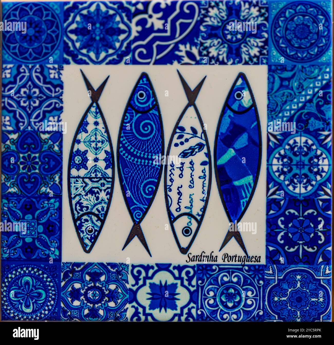 Blue wall tile with sardines on it on a wall in Portugal Stock Photo ...