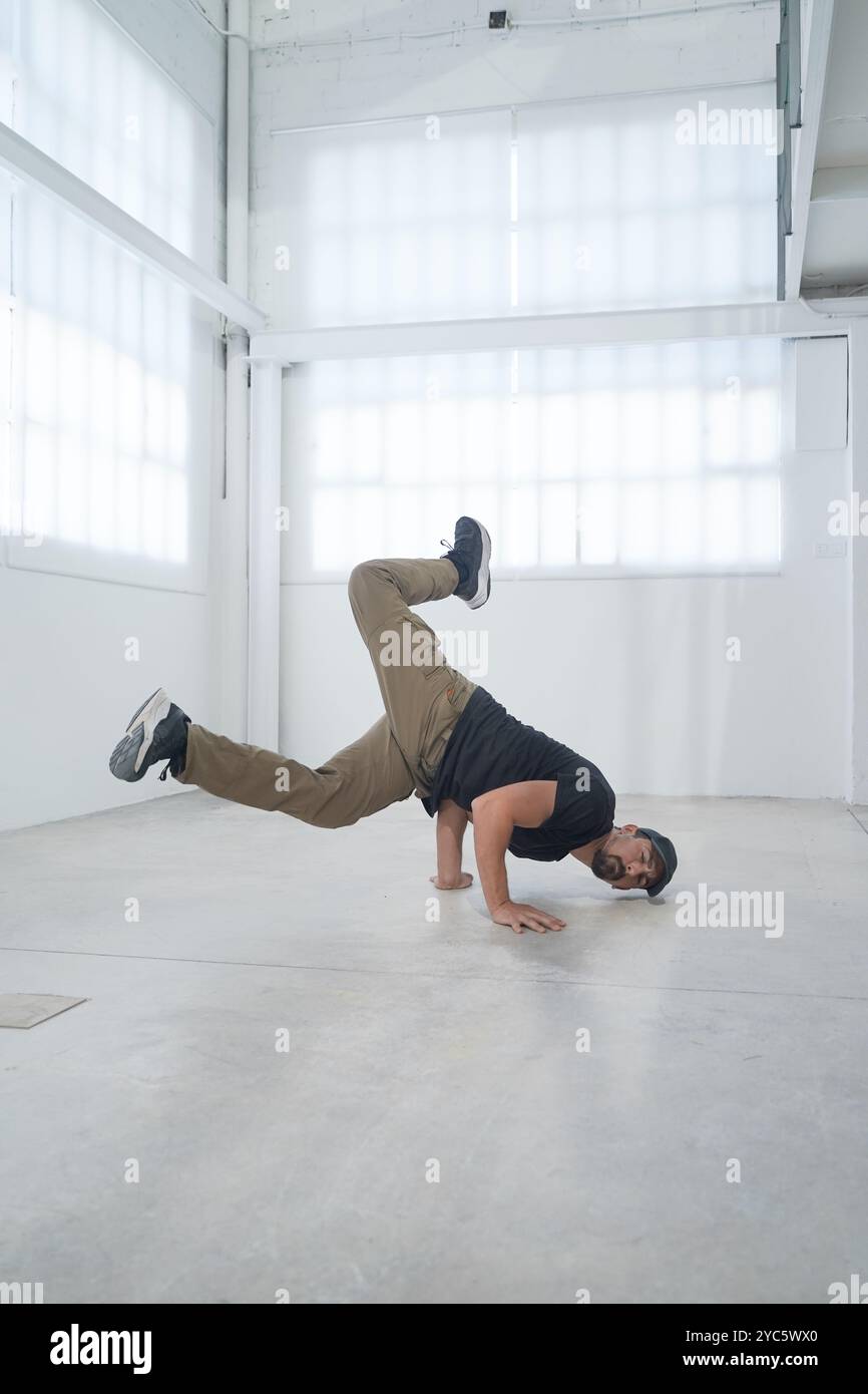 Happy man enjoy practice break dance freestyle. Professional b-boy ...