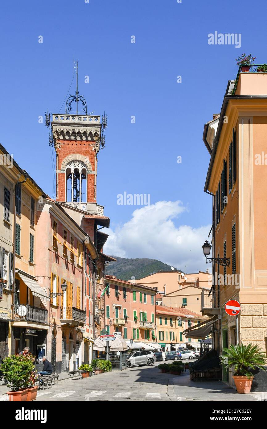 Street view with the tower of Palazzo Fascie Rossi (early 1900s), seat ...