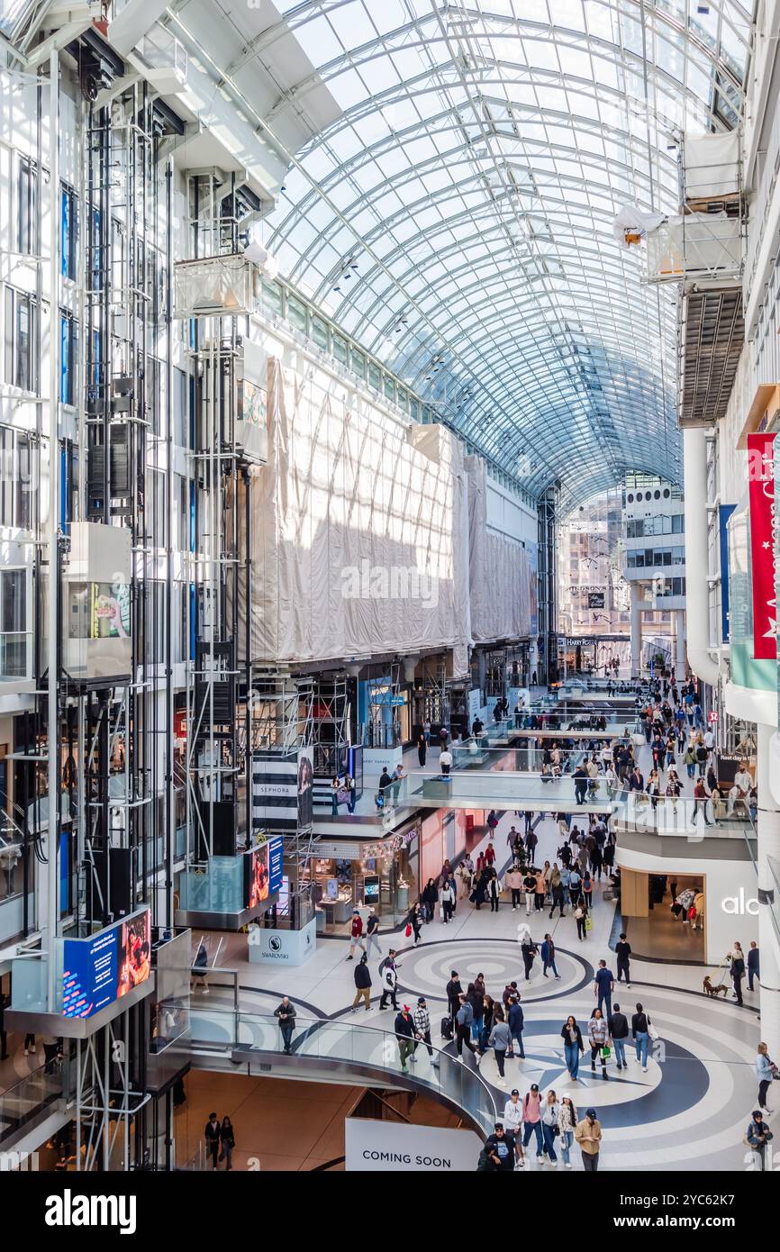 Toronto Eaton Centre interior with shoppers during the day Stock Photo ...