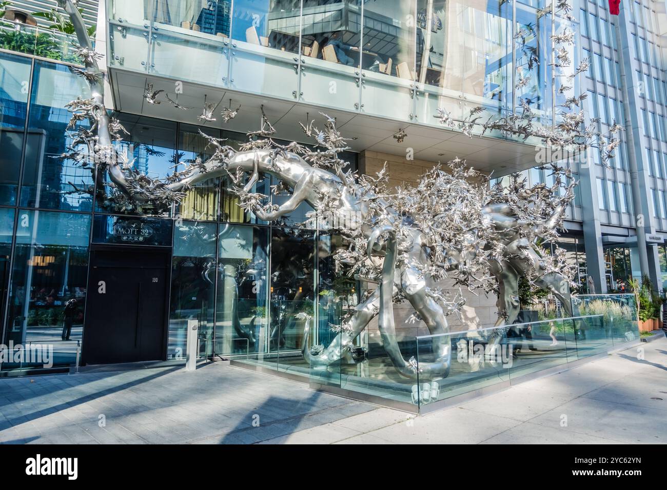 "Rising" is a stainless steel sculpture by Zhang Huan, located in front ...