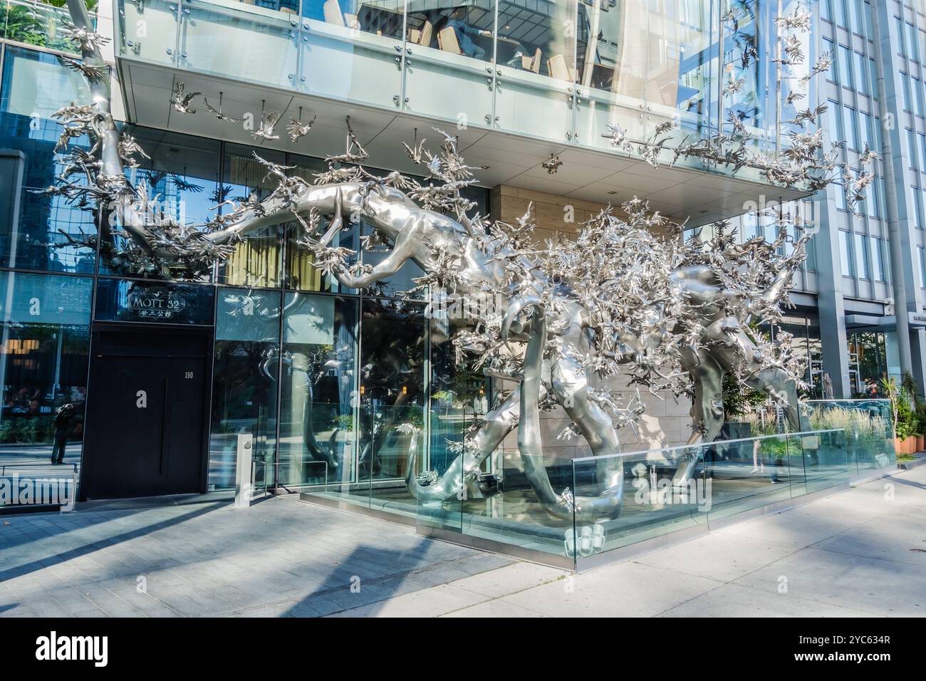 "Rising" is a stainless steel sculpture by Zhang Huan, located in front ...