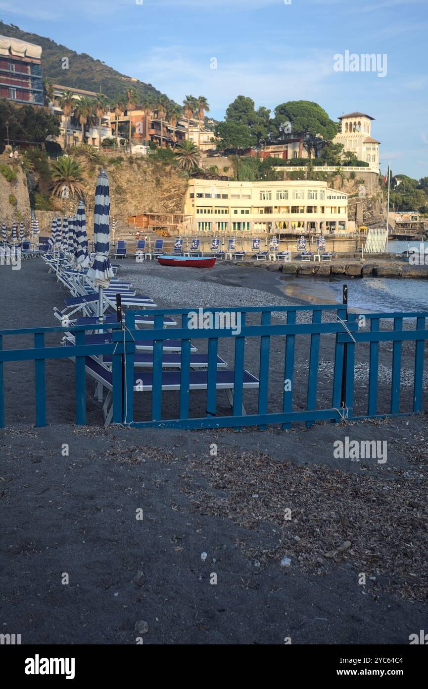 Beach resort in a cove of an italian town at sunset Stock Photo - Alamy