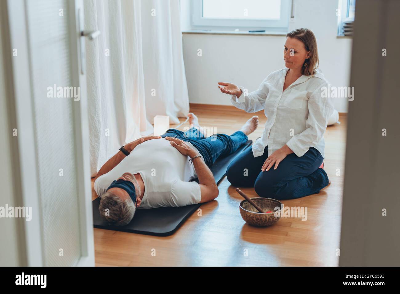 Mindful meditation sitting indoors hi-res stock photography and images ...