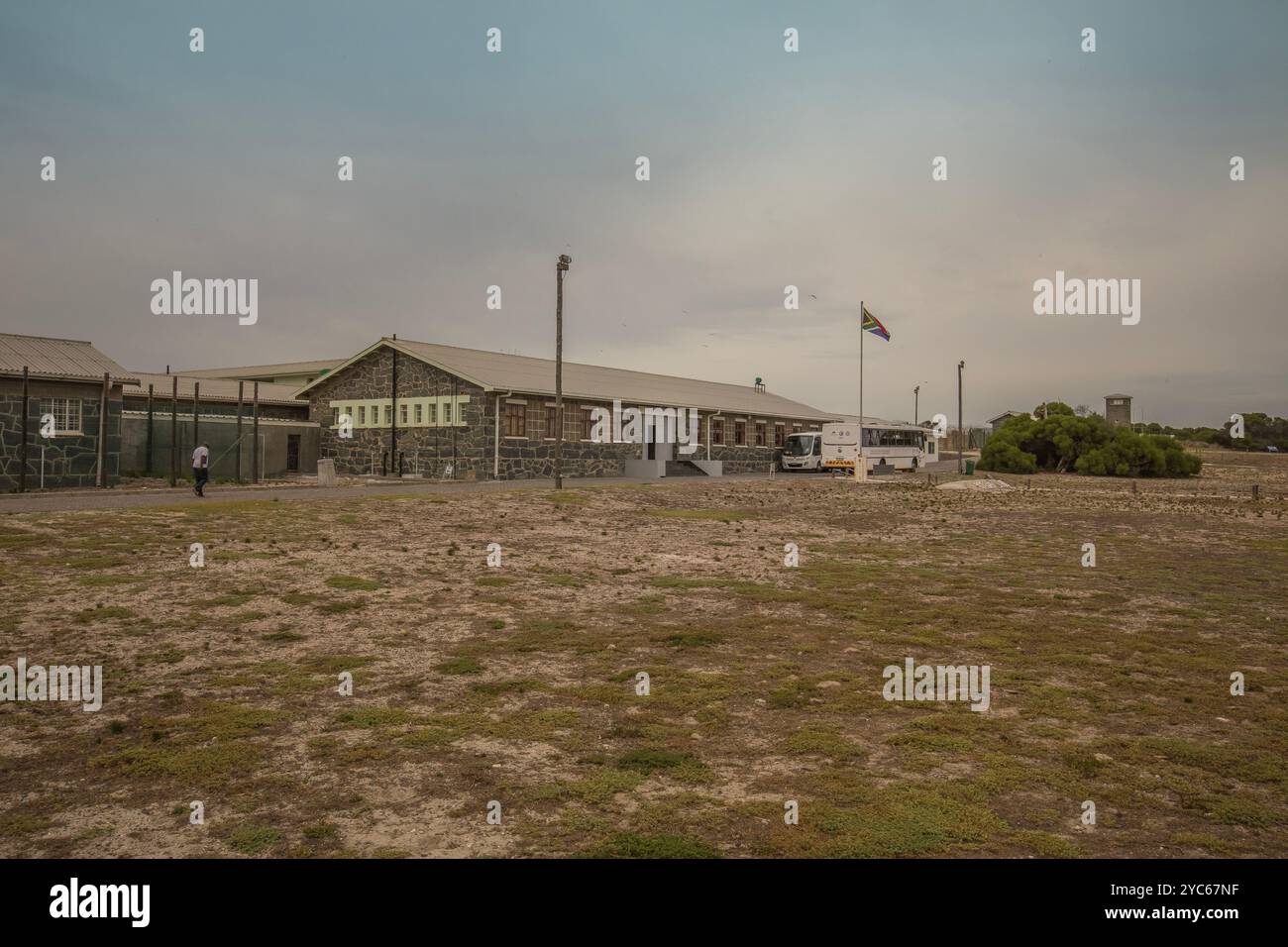 Robben Island prison with South African flag visible Stock Photo - Alamy