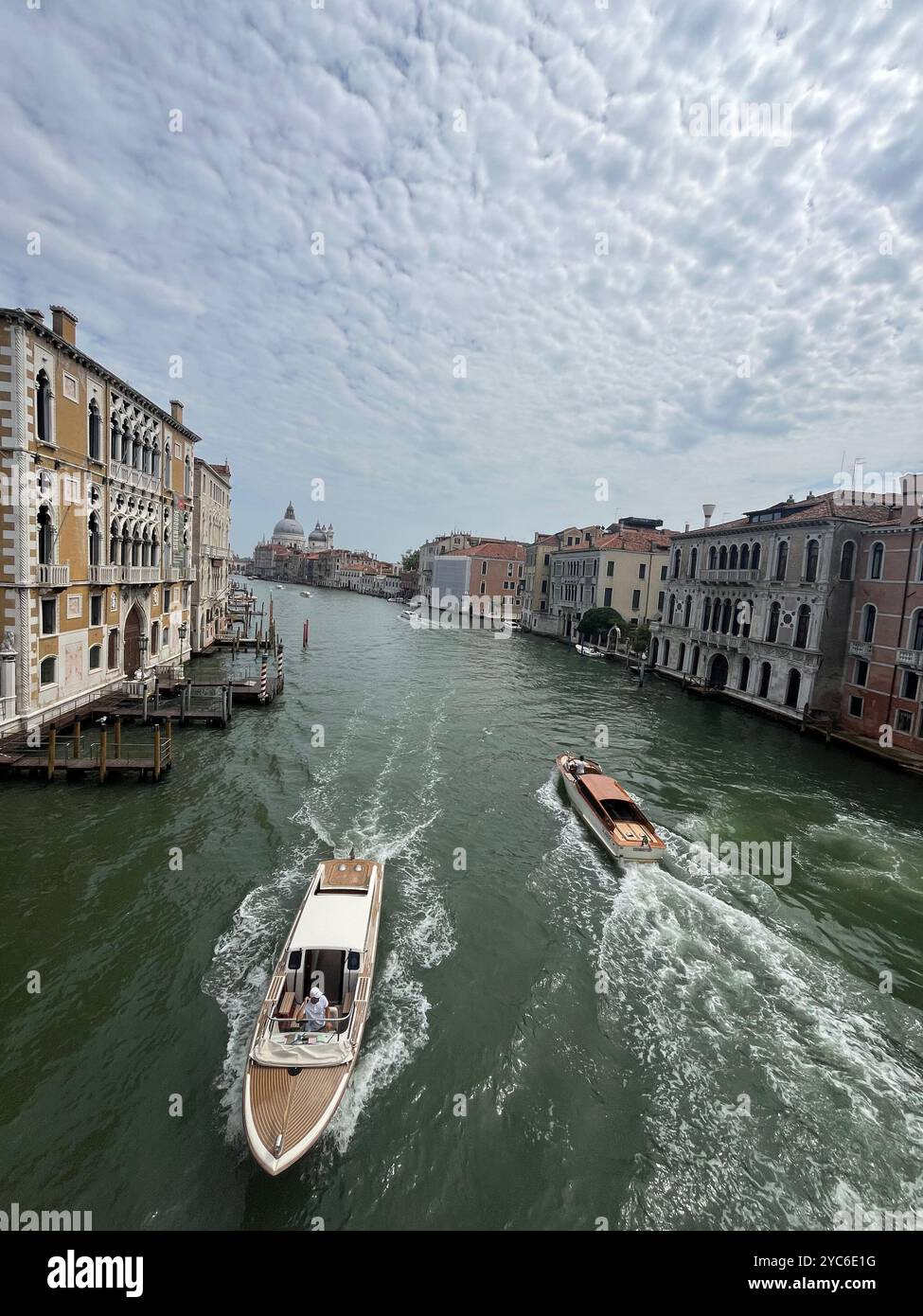 Venice , Two boats passing each other in Venice canals Stock Photo - Alamy