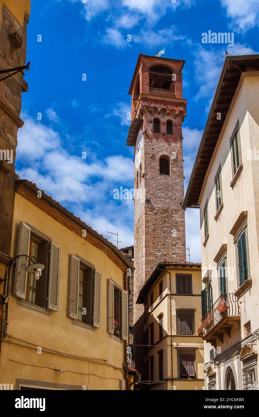 Lucca beautiful medieval historical center alley with old 'Torre dell ...