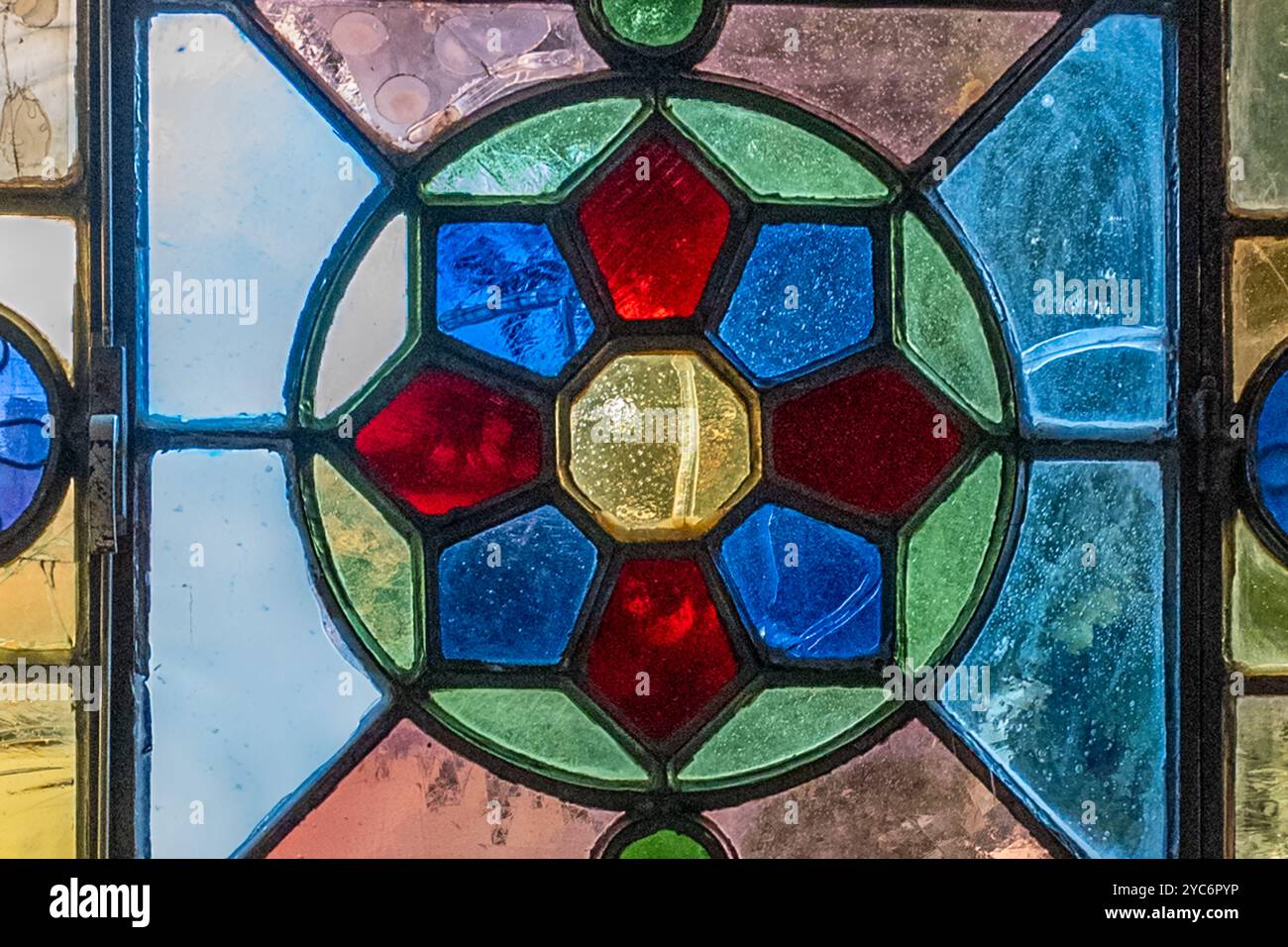 Colorful stained glass detail with geometric pattern Stock Photo - Alamy