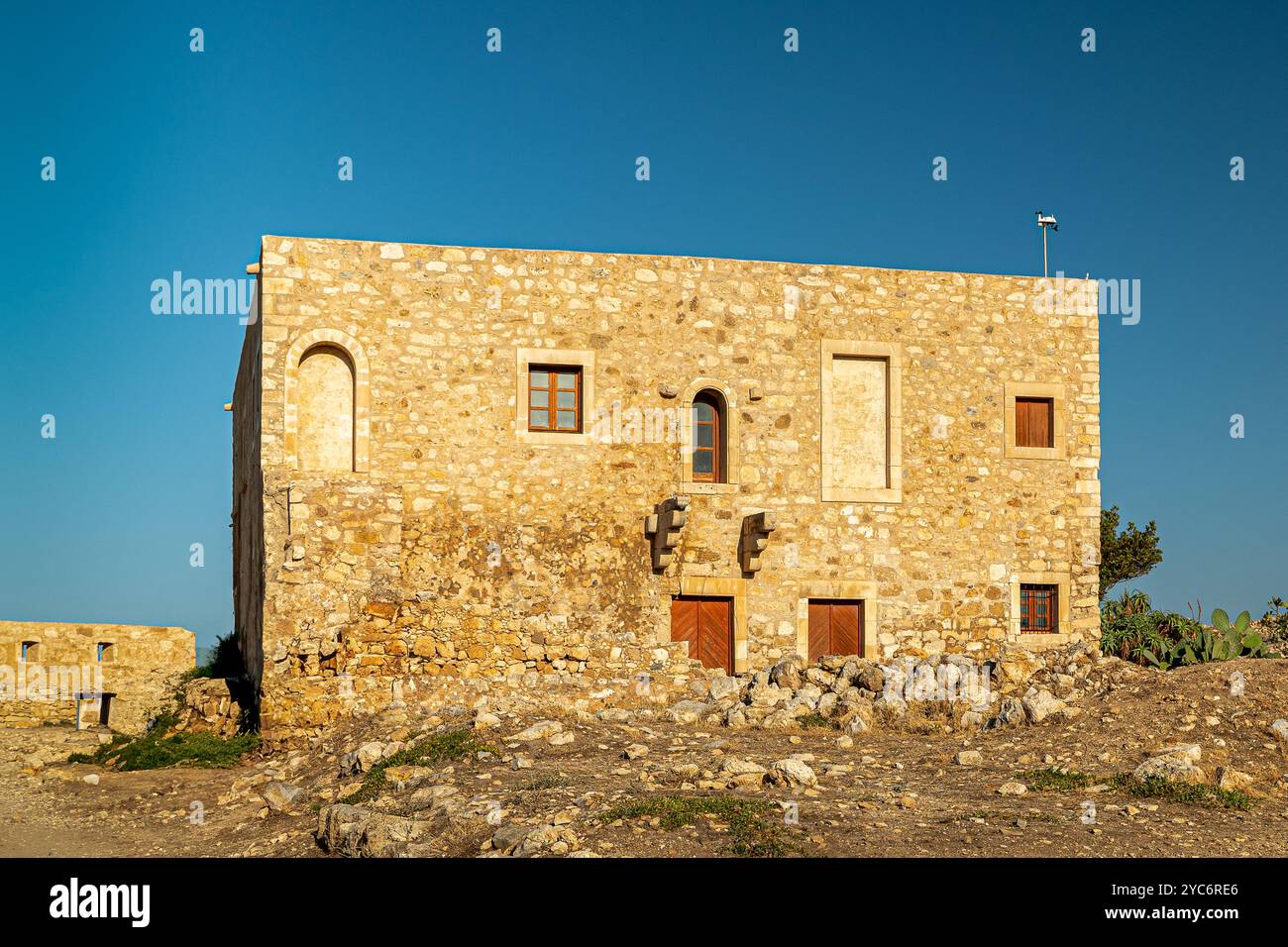 An old stone building with a simple, solid structure standing under a ...
