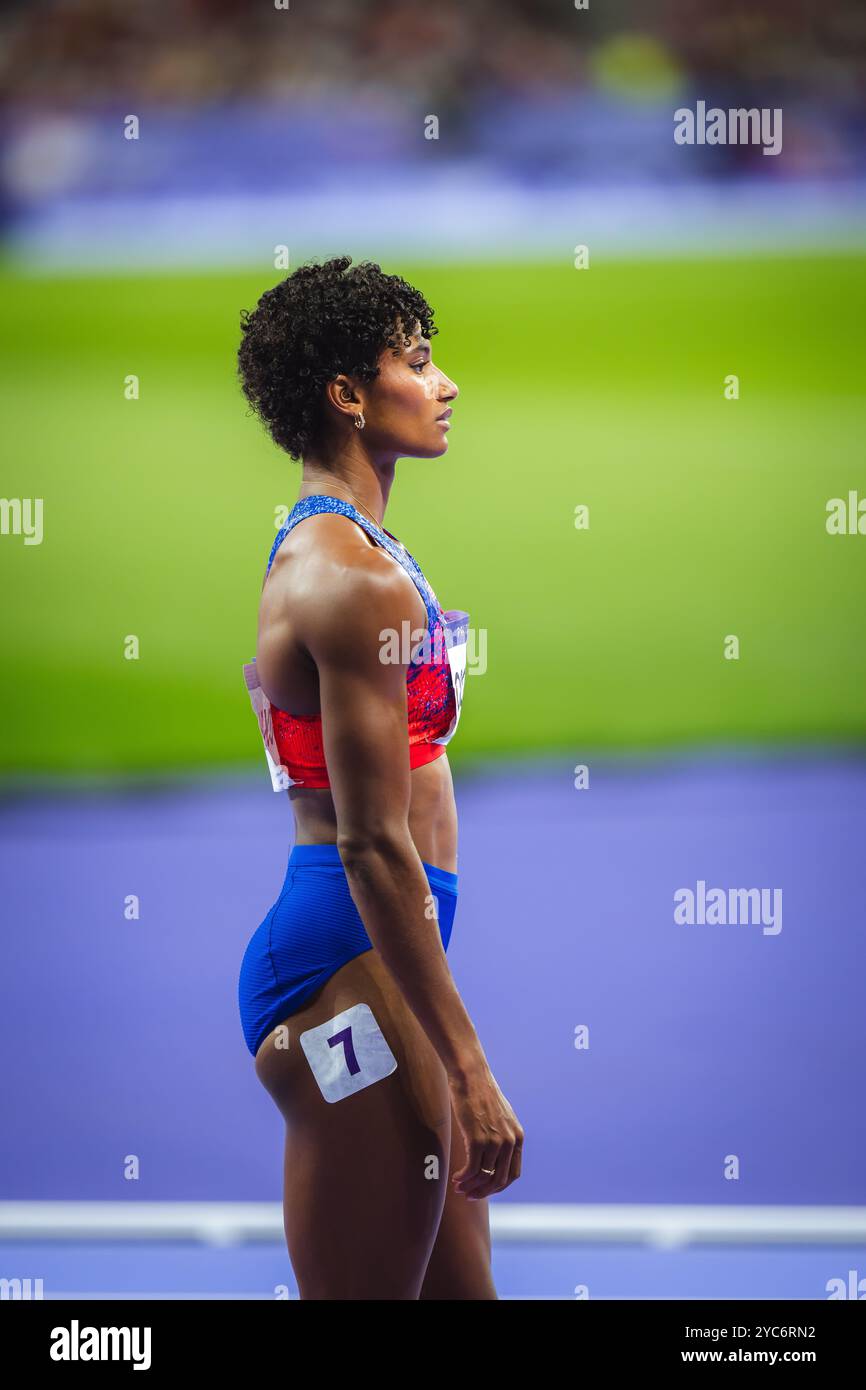 Anna Cockrell participating in the 400 meters hurdles at the Paris 2024 ...