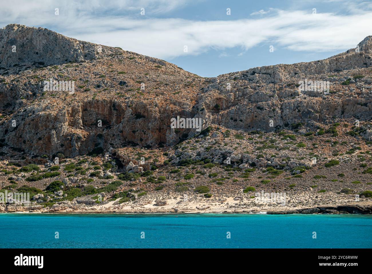 A scenic view of the rocky landscape of Gramvousa, Crete, with a rugged ...