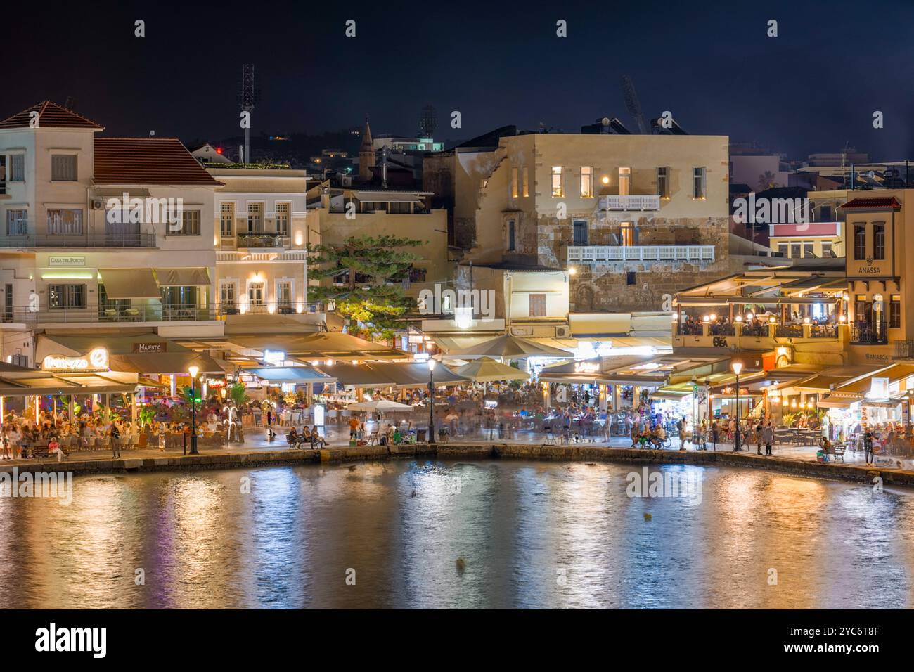 Evening Lights at Chania Harbor A beautiful night view of the lively ...
