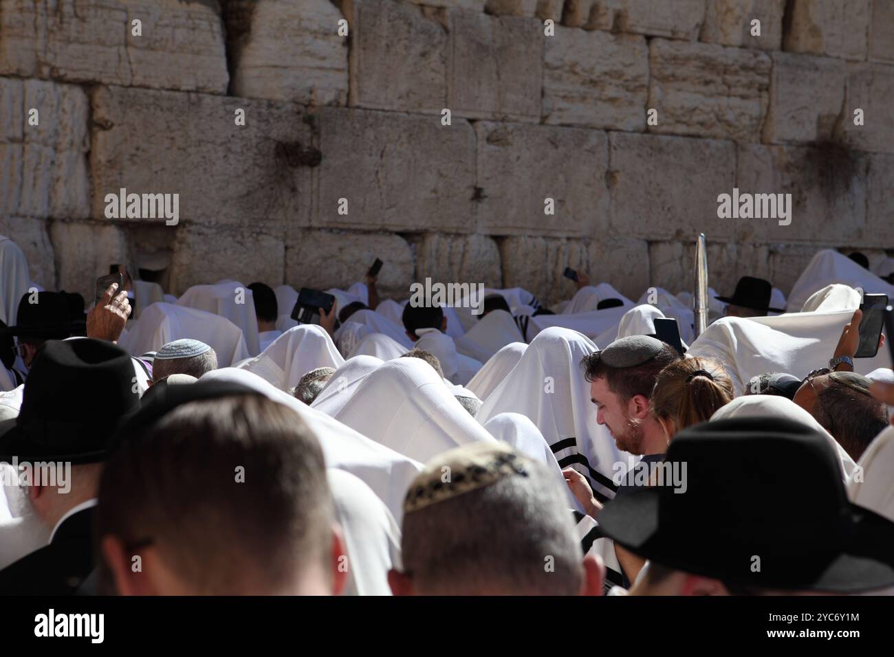 Birkat Kohanim or Priests' Prayer, the priests face & point fingers ...