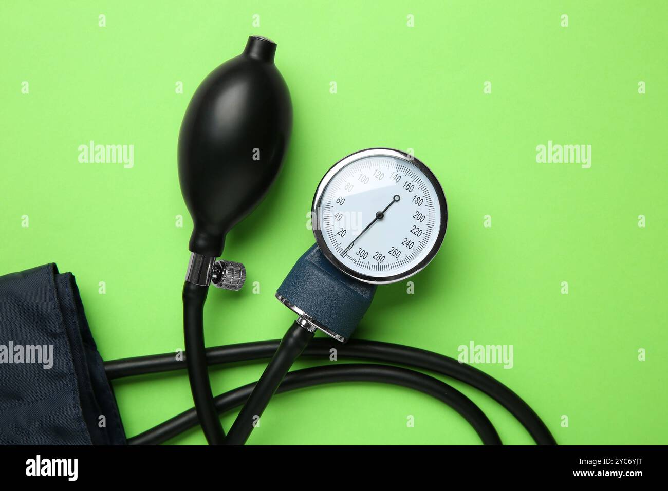 Blood pressure measuring device on green background, top view Stock ...