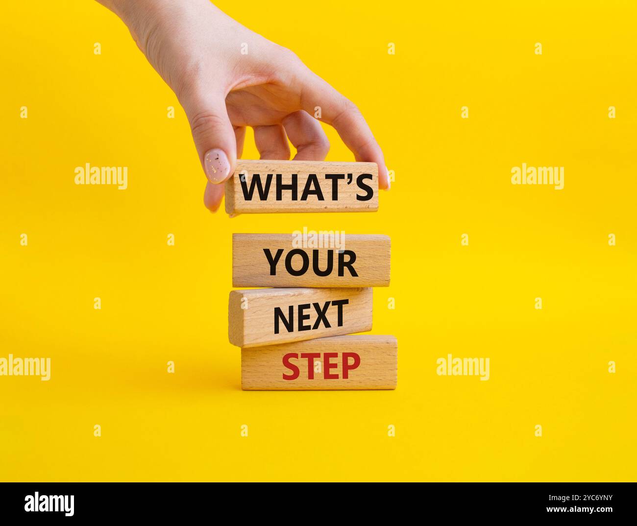 What is your next step symbol. Wooden blocks with words What is your ...