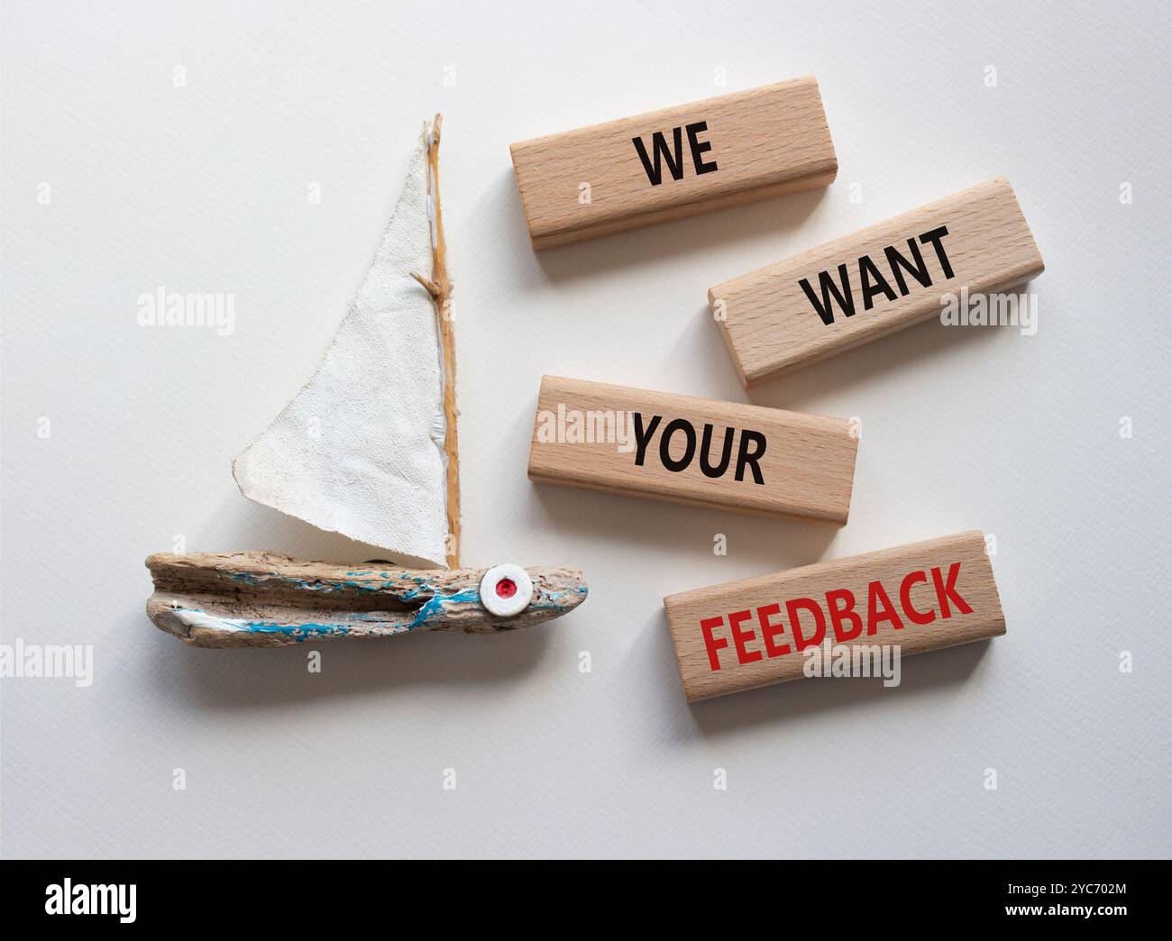 We want your feedback symbol. Wooden blocks with words We want your ...