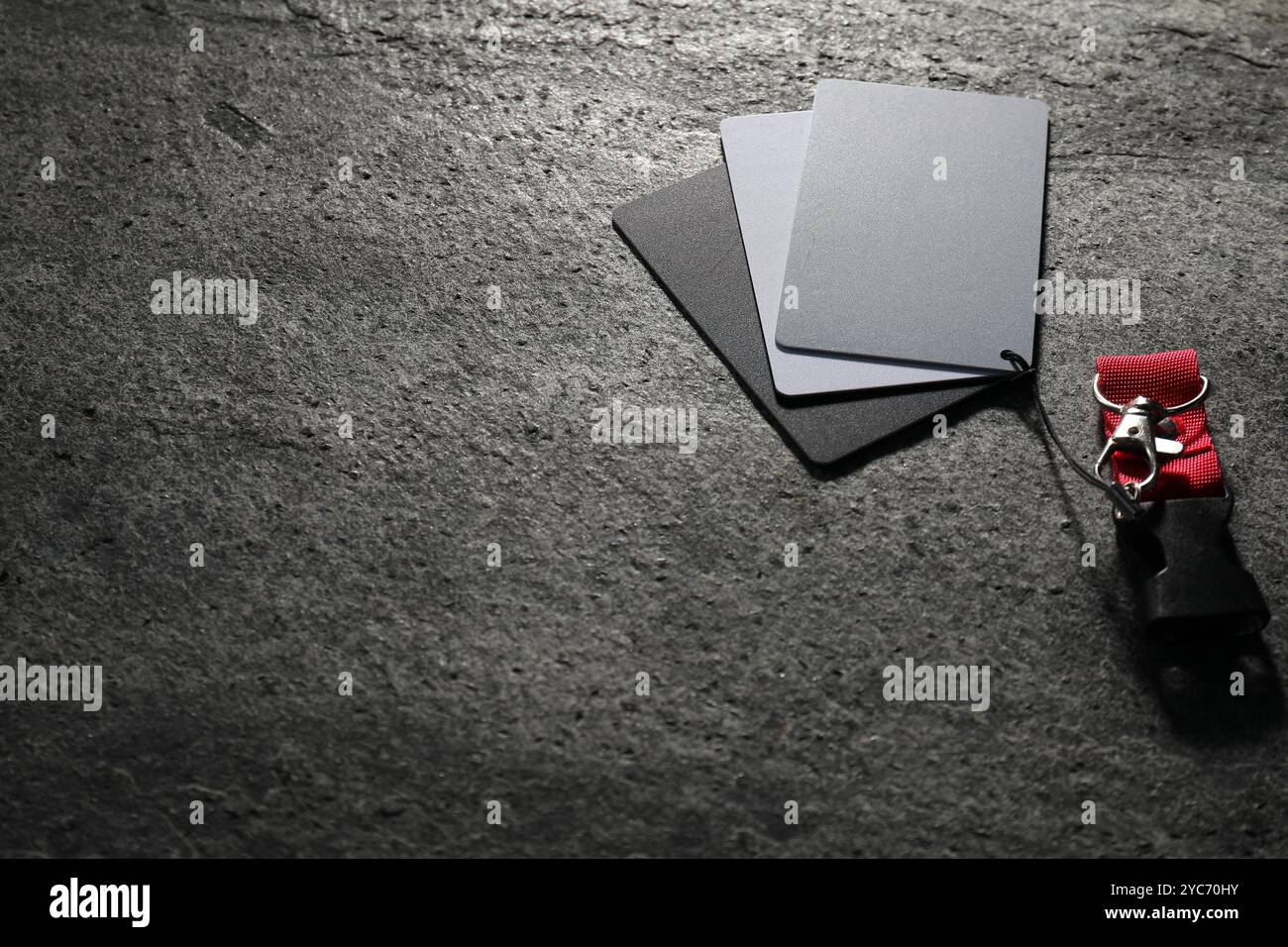 White balance calibration cards on grey background. Space for text ...