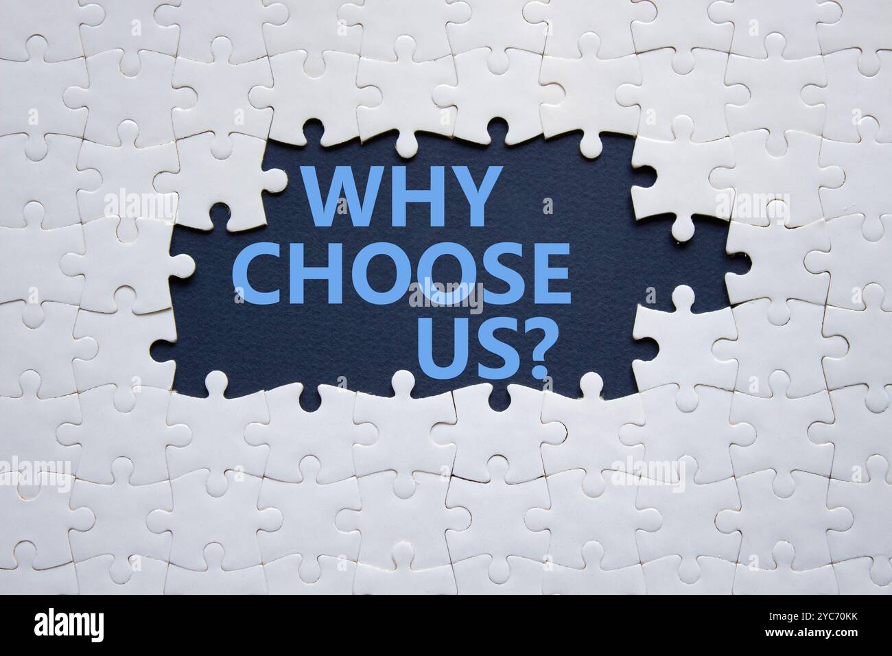 Why choose us symbol. Concept words Why choose us on white puzzle ...
