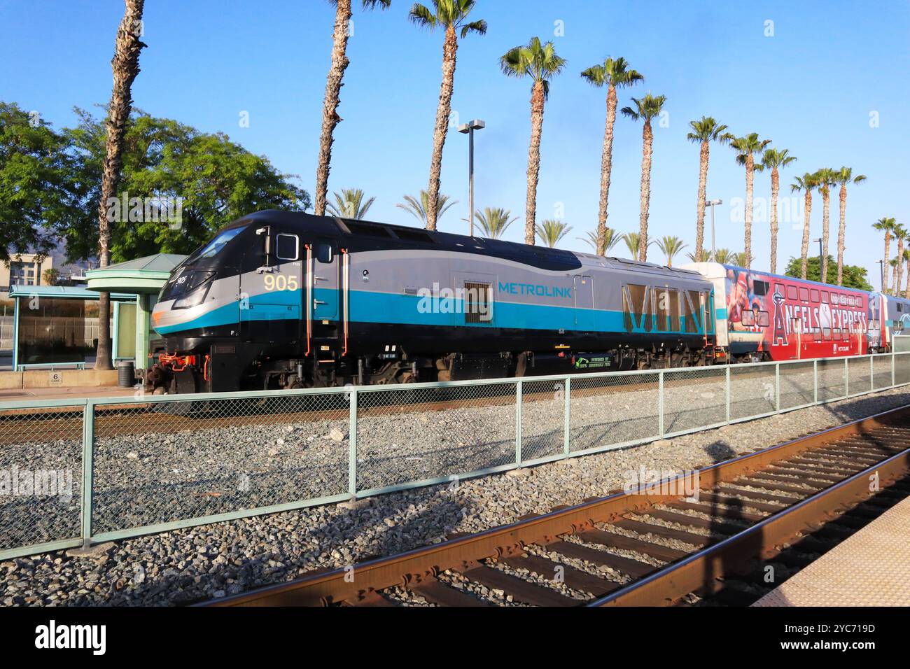 Metrolink train on the platform at Downtown Burbank Station, California ...