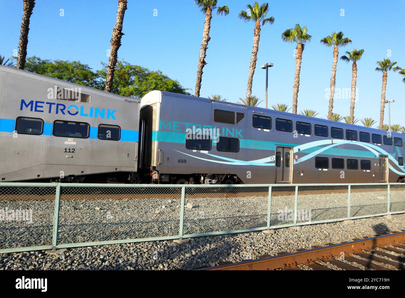 Metrolink train on the platform at Downtown Burbank Station, California ...