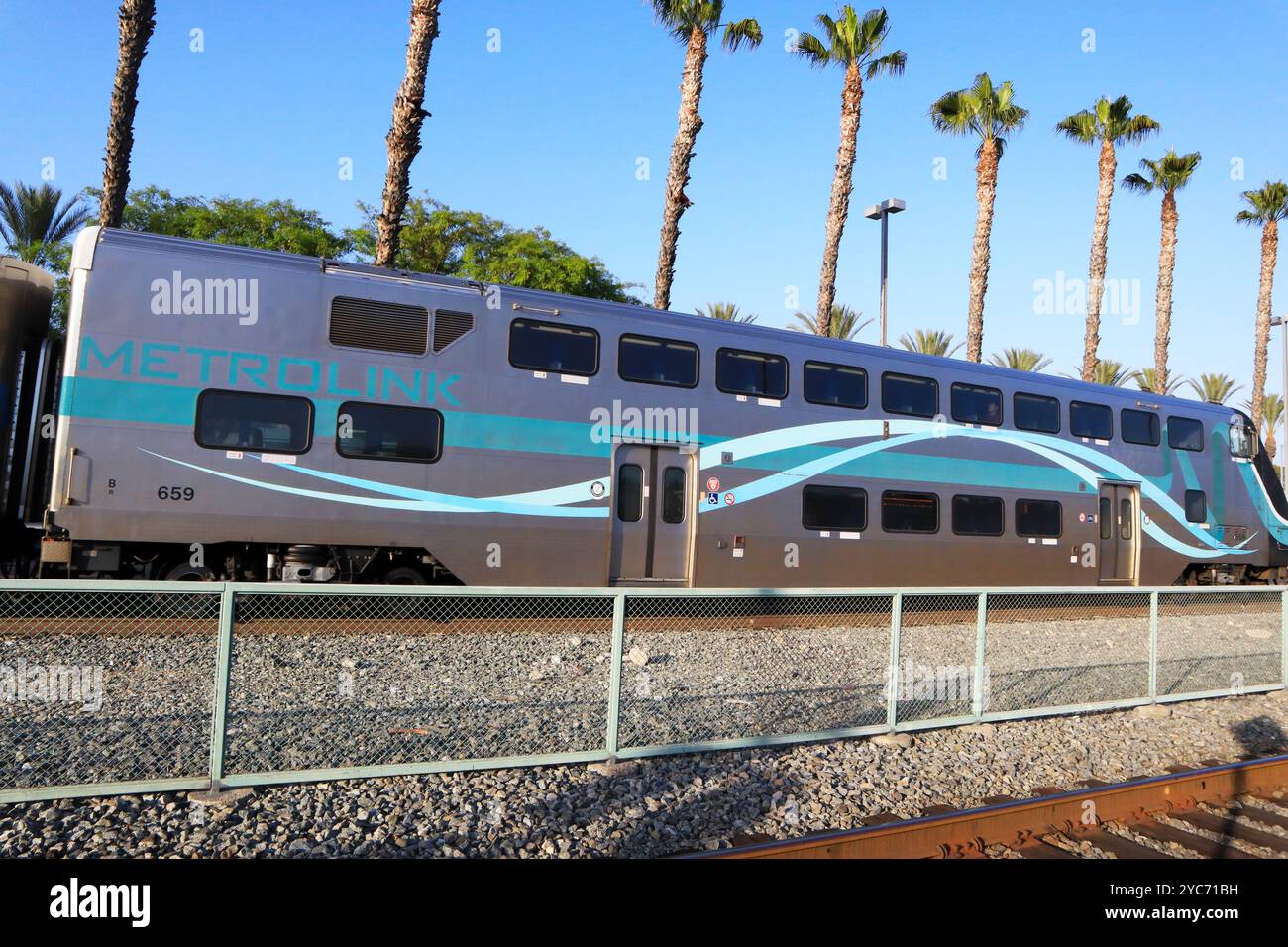 Metrolink train on the platform at Downtown Burbank Station, California ...