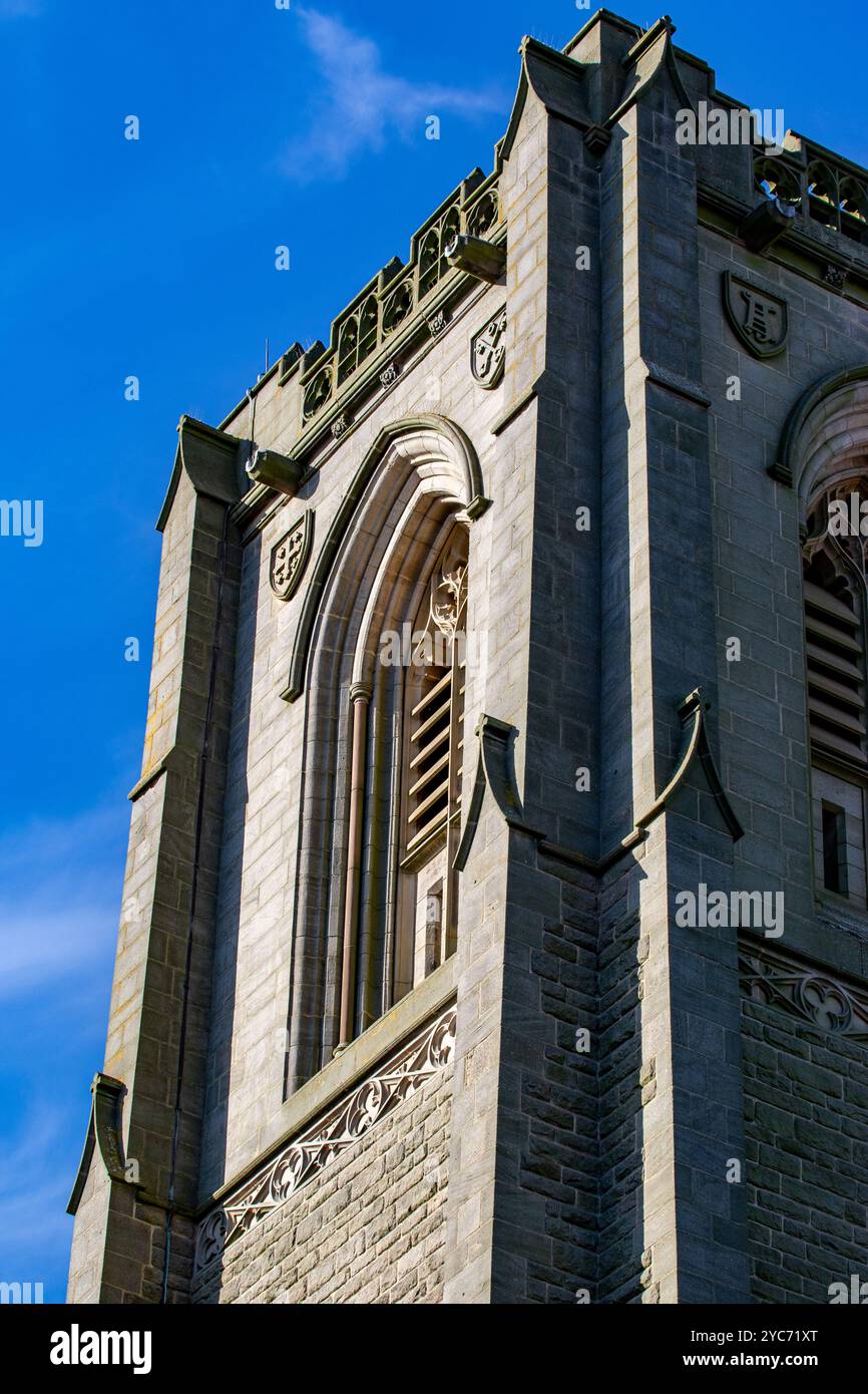 A close-up view of a stone tower with intricate architectural details ...