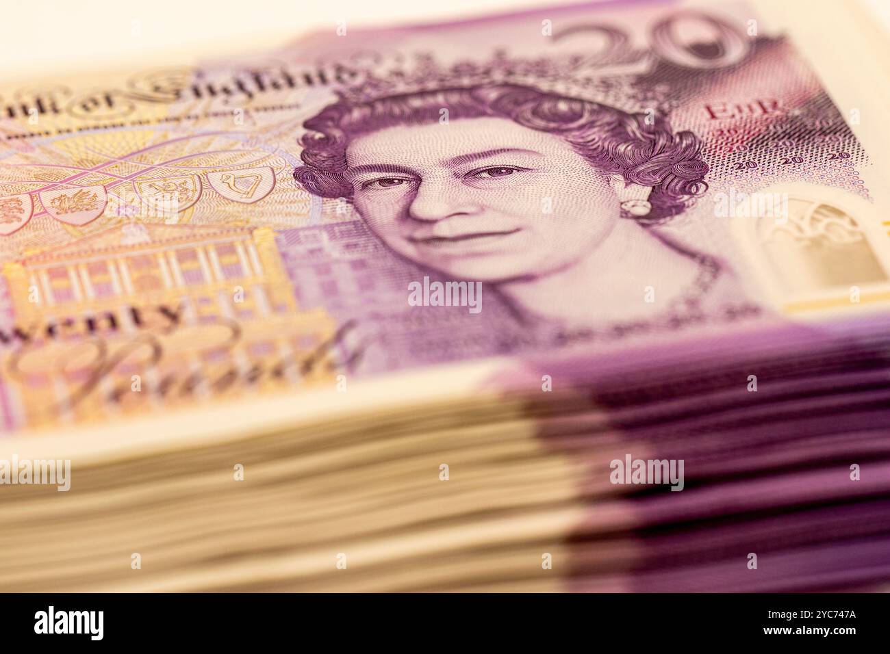 A closeup of a stack of twenty pound banknotes from the United Kingdom ...