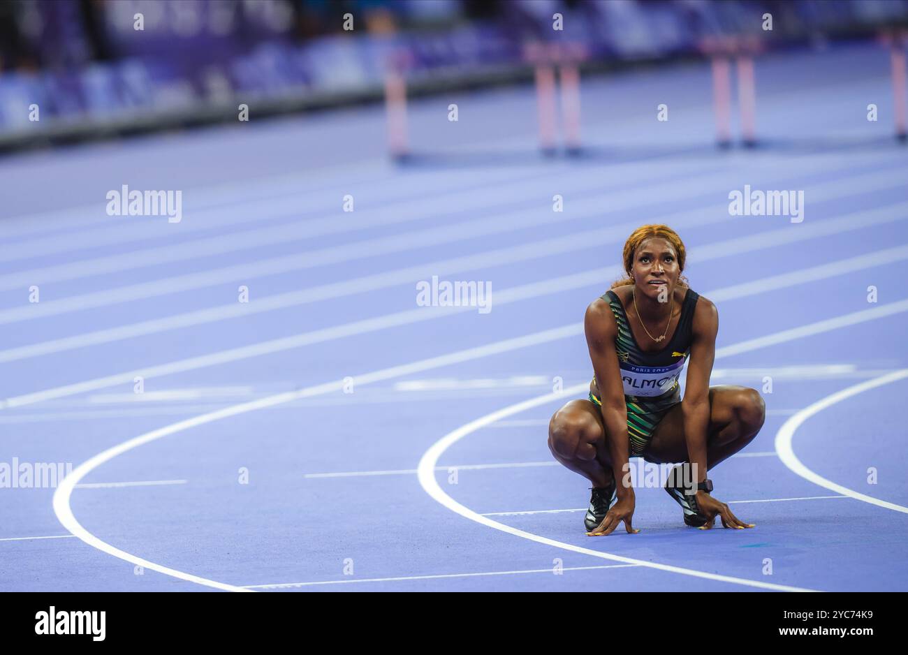 Shiann Salmon participating in the 400 meters hurdles at the Paris 2024 ...