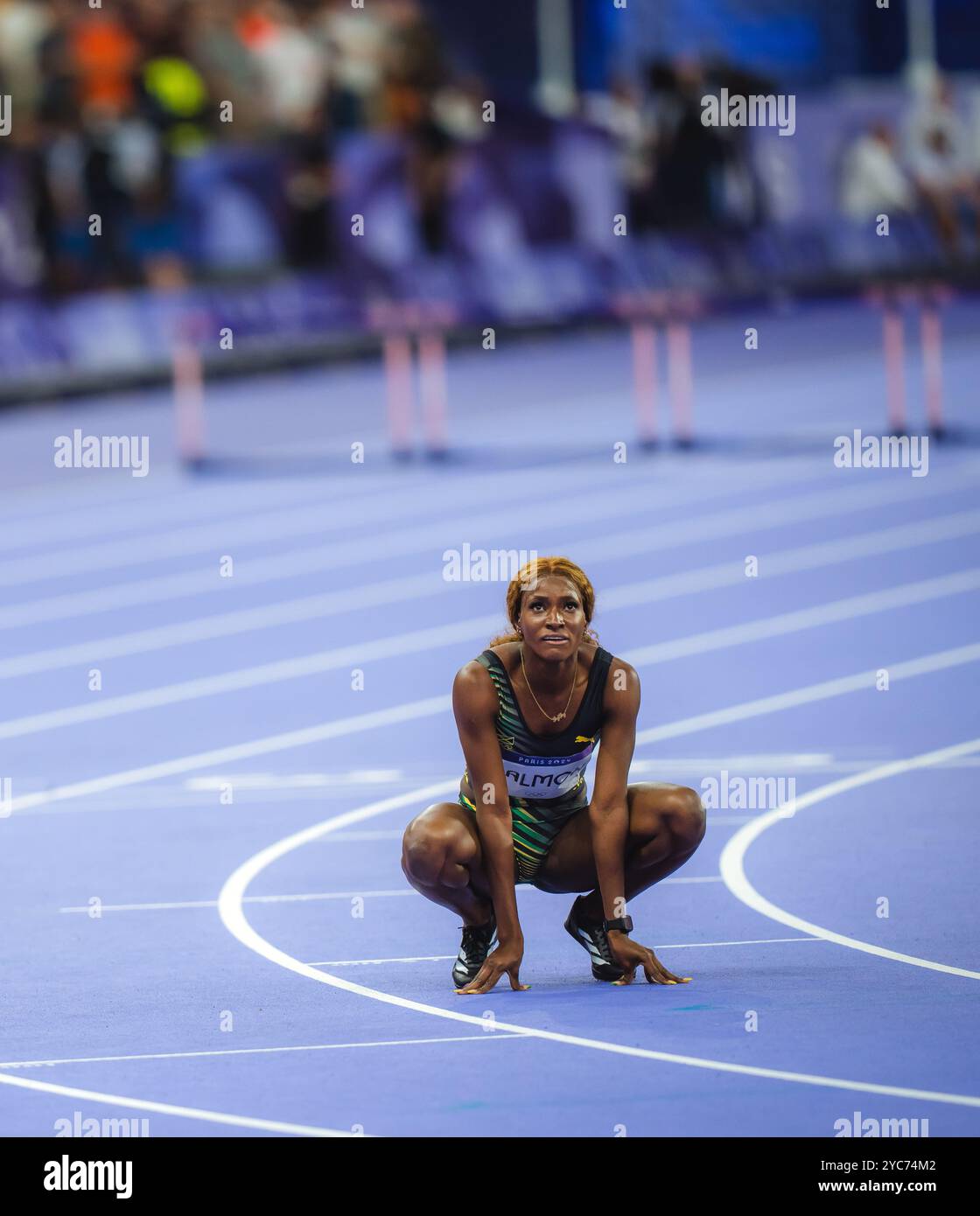 Shiann Salmon participating in the 400 meters hurdles at the Paris 2024 ...
